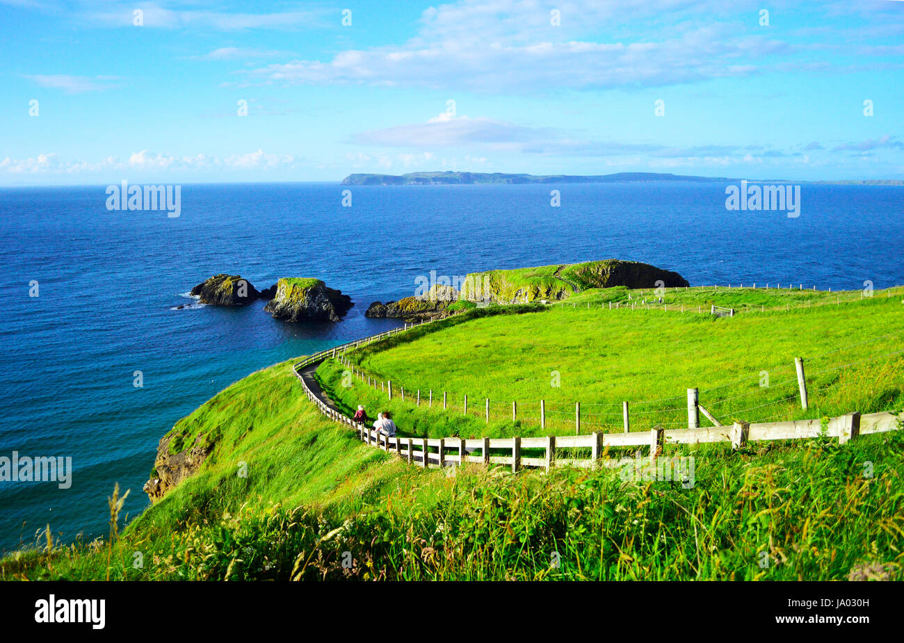 People Walking Along the Coastline Footpath to Carrick-a-Rede Rope ...