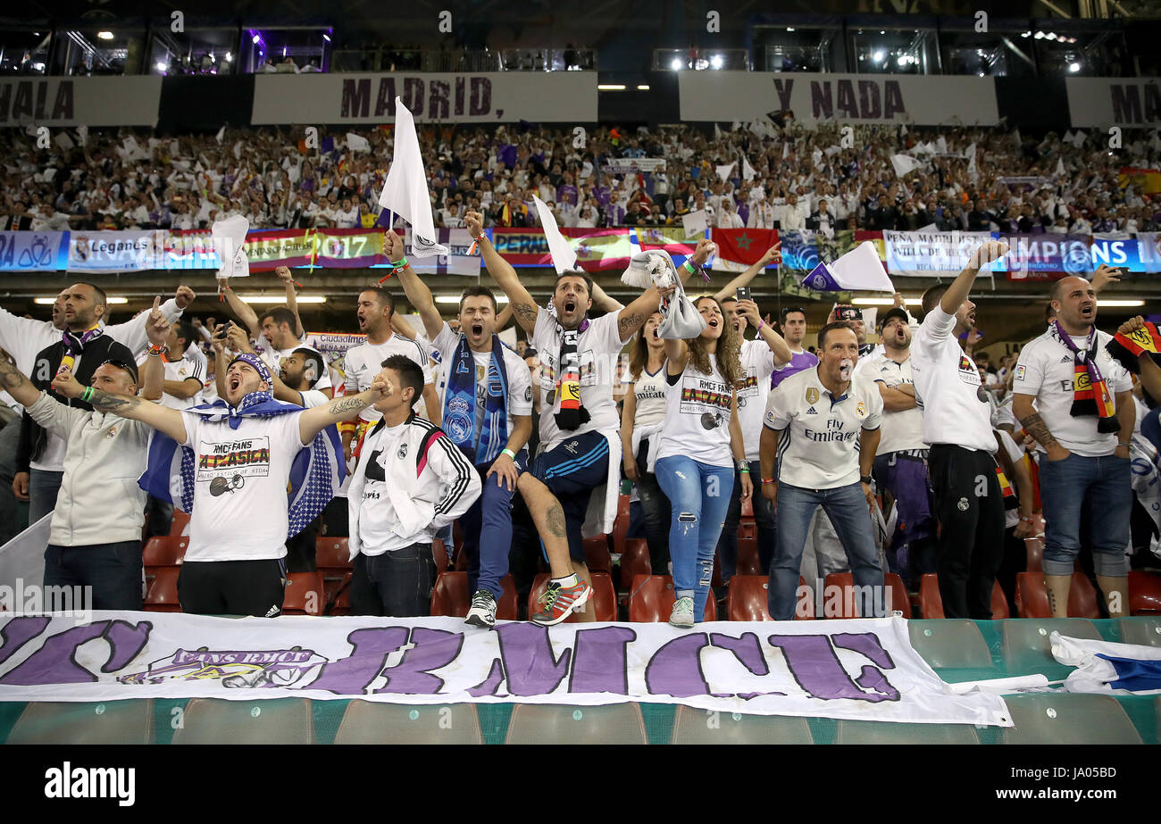 Real Madrid fans show support for their team in the stands during the ...
