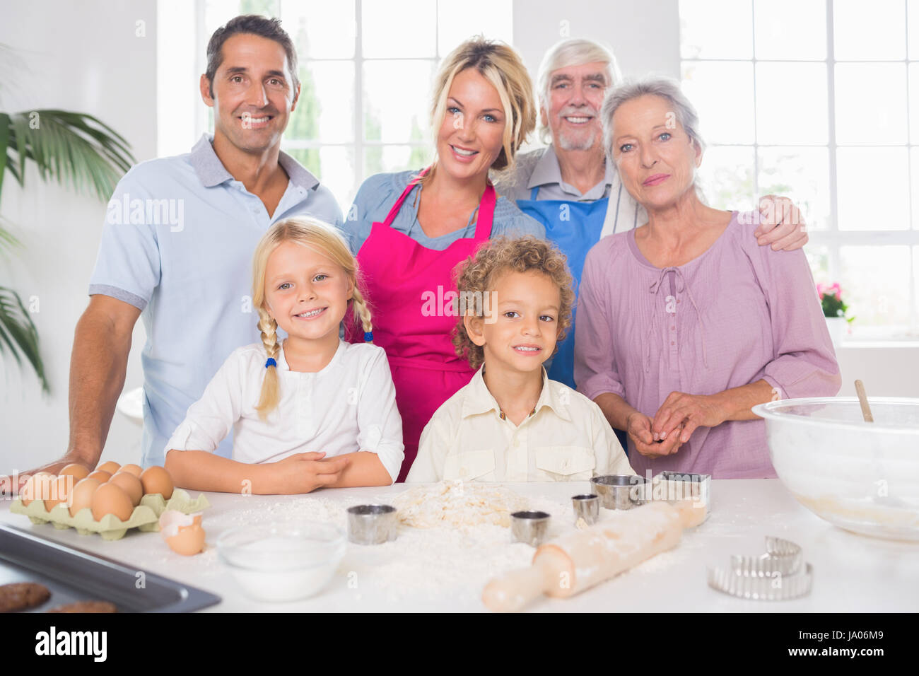 Family cooking together in the kitchen Stock Photo - Alamy
