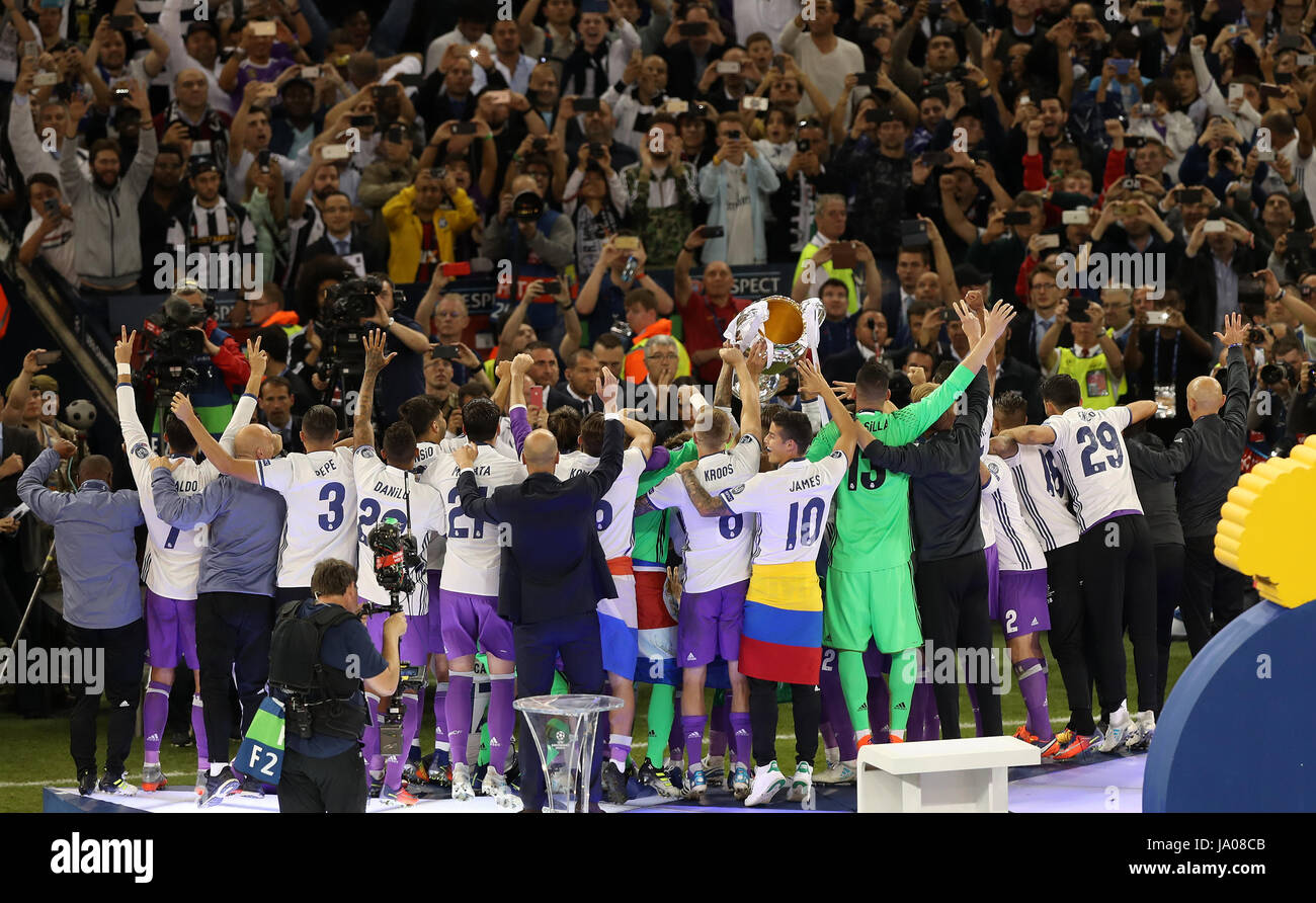 The Real Madrid team celebrate with the trophy after winning the UEFA ...