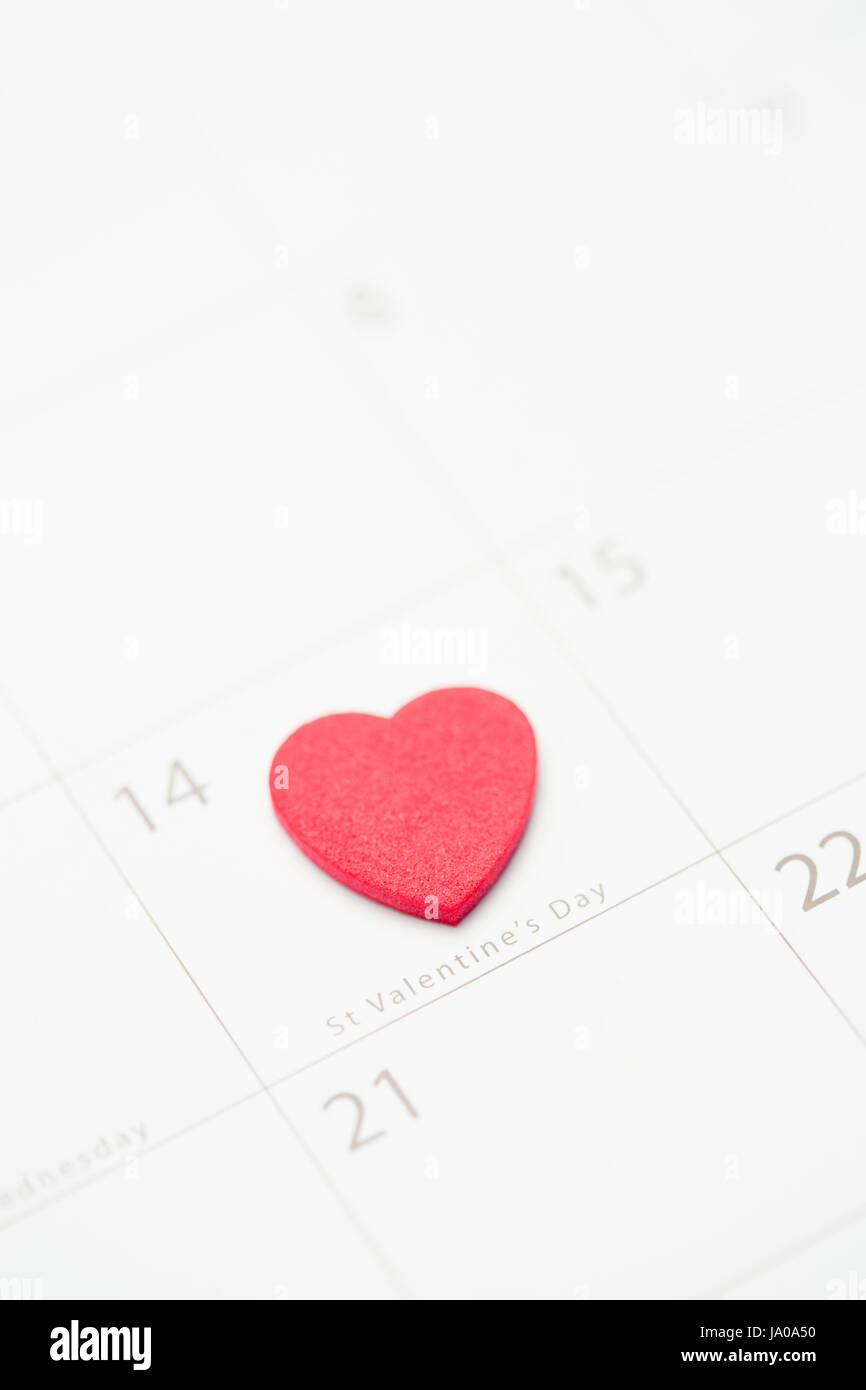 Pink heart marking valentines day on calendar Stock Photo - Alamy
