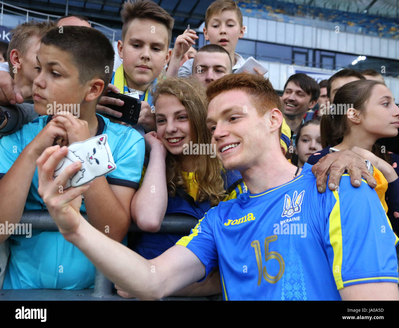 KYIV, UKRAINE - JUNE 2, 2017: Football fans make selfie portrait with ...