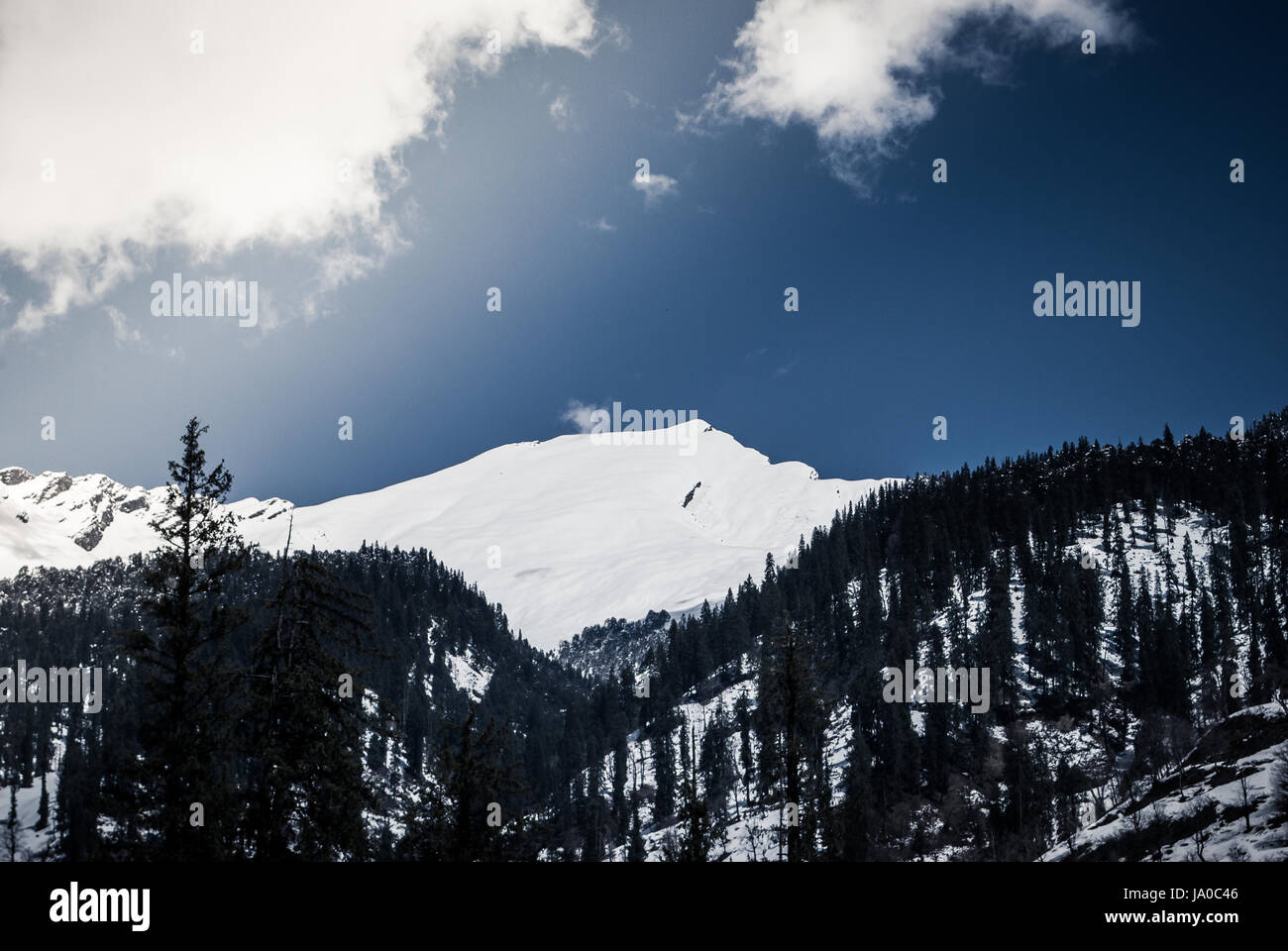 Snow Peak mountain Stock Photo - Alamy