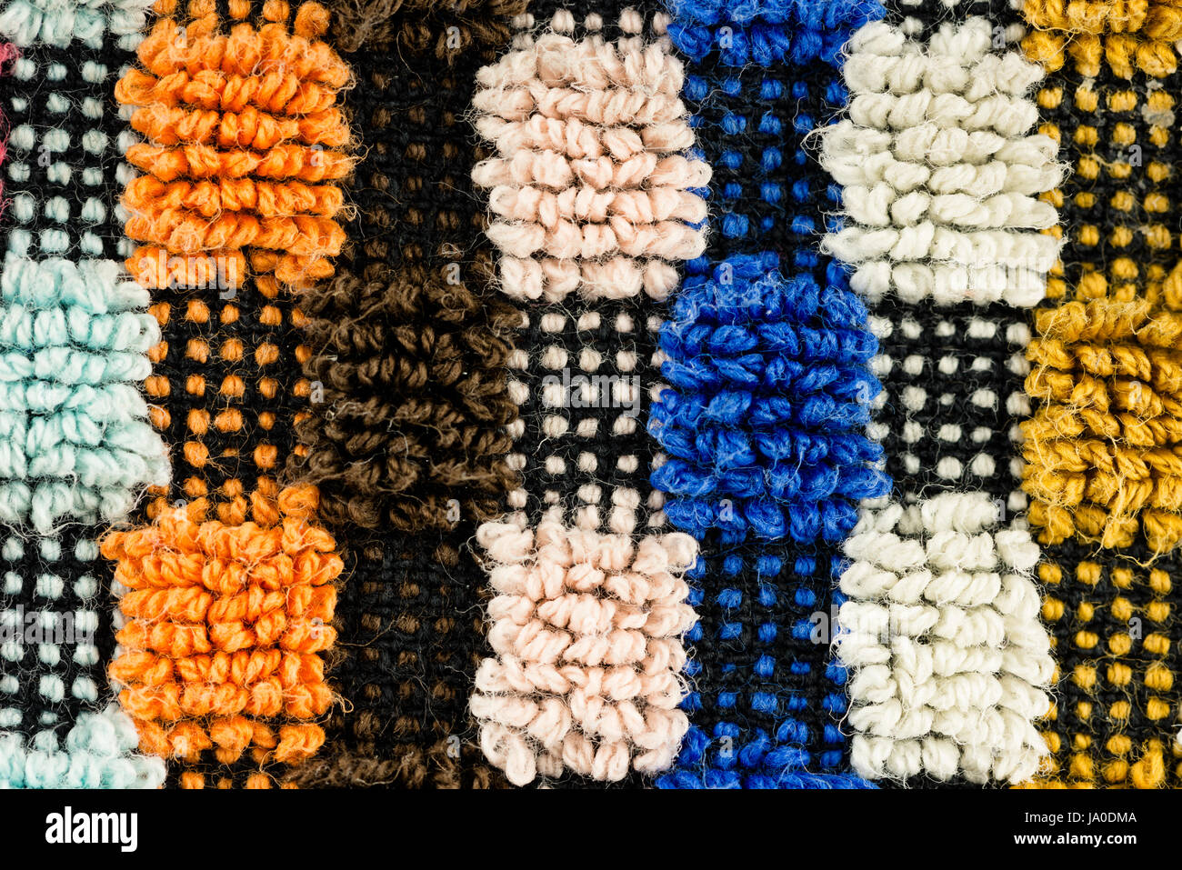 close-up of a multi coloured detailed structured fabric pattern Stock ...