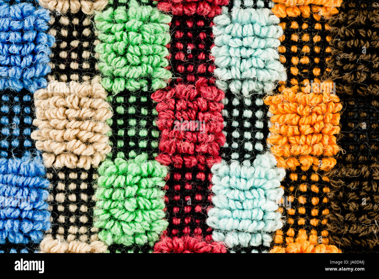 close-up of a multi coloured detailed structured fabric pattern Stock ...