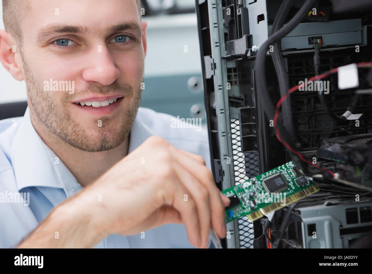 Inserting cpu hi-res stock photography and images - Alamy