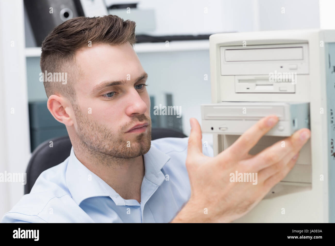 Inserting cpu hi-res stock photography and images - Alamy