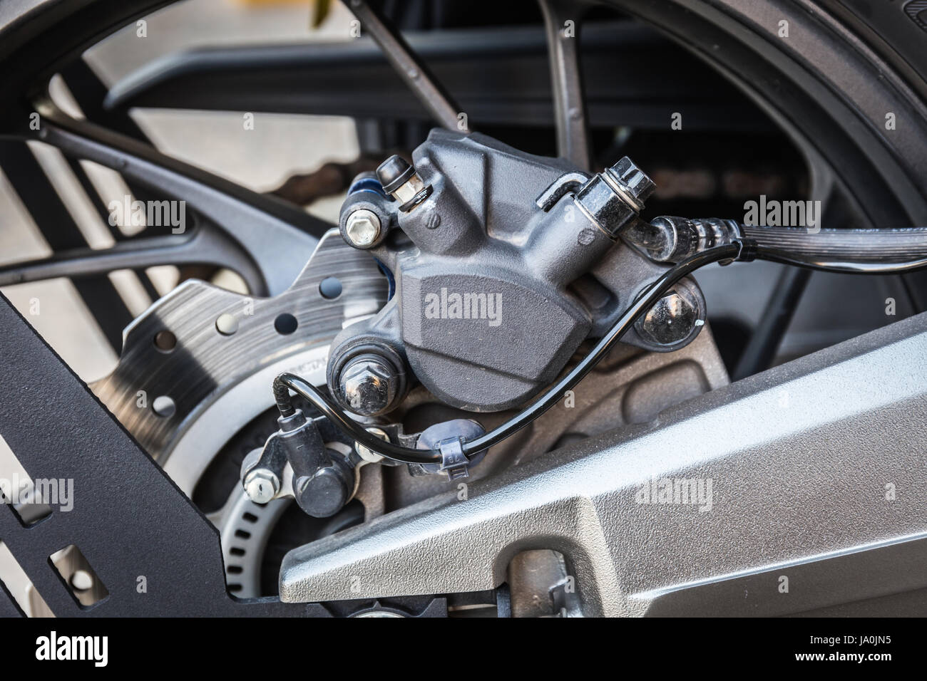 Detail of motorcycle back disc brakes system, close up image Stock ...