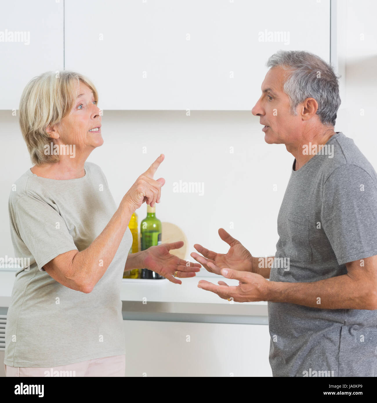 Wife arguing with her husband in the kitchen Stock Photo - Alamy