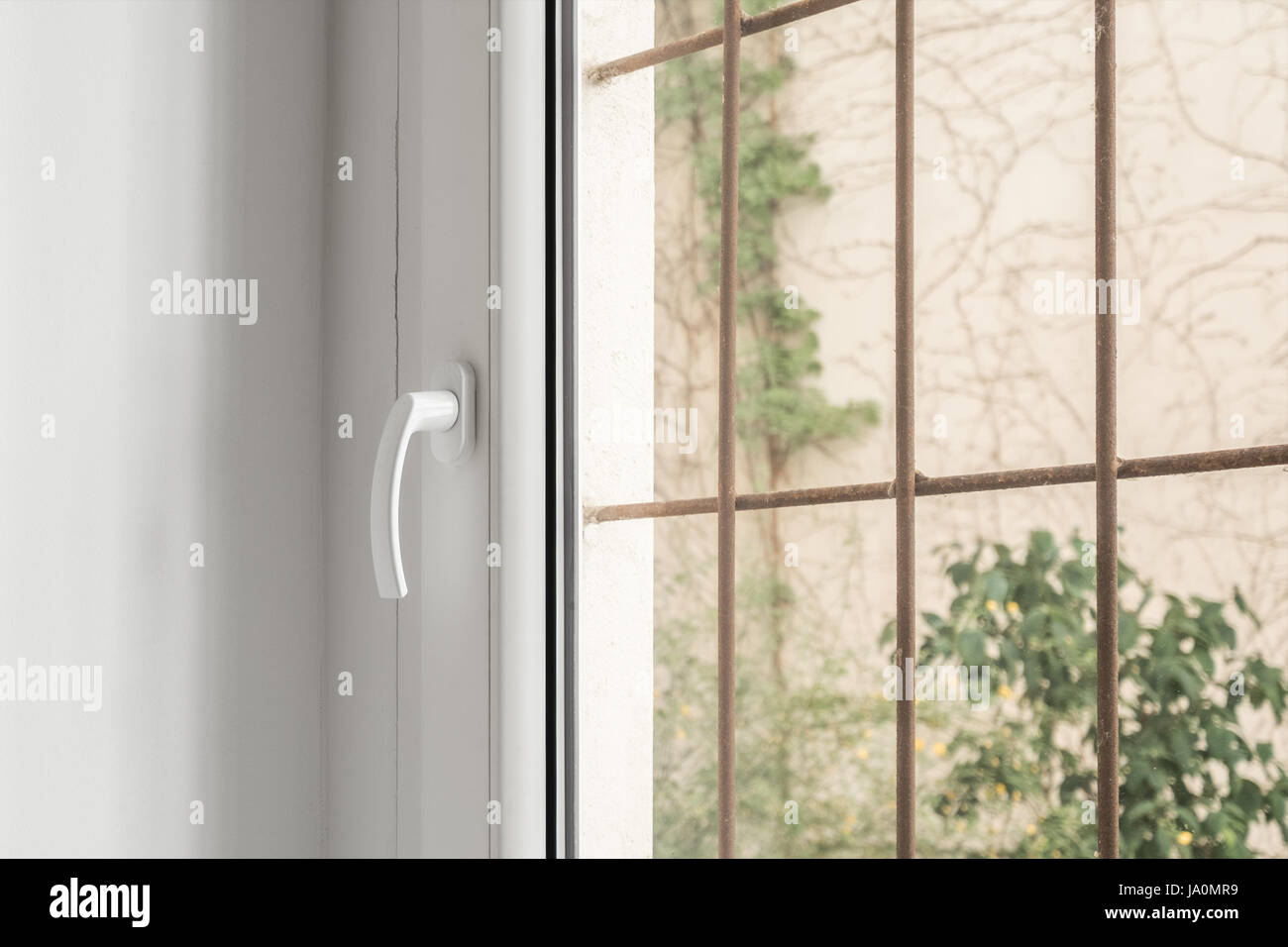 window with metal bars - burglar-proof window Stock Photo - Alamy