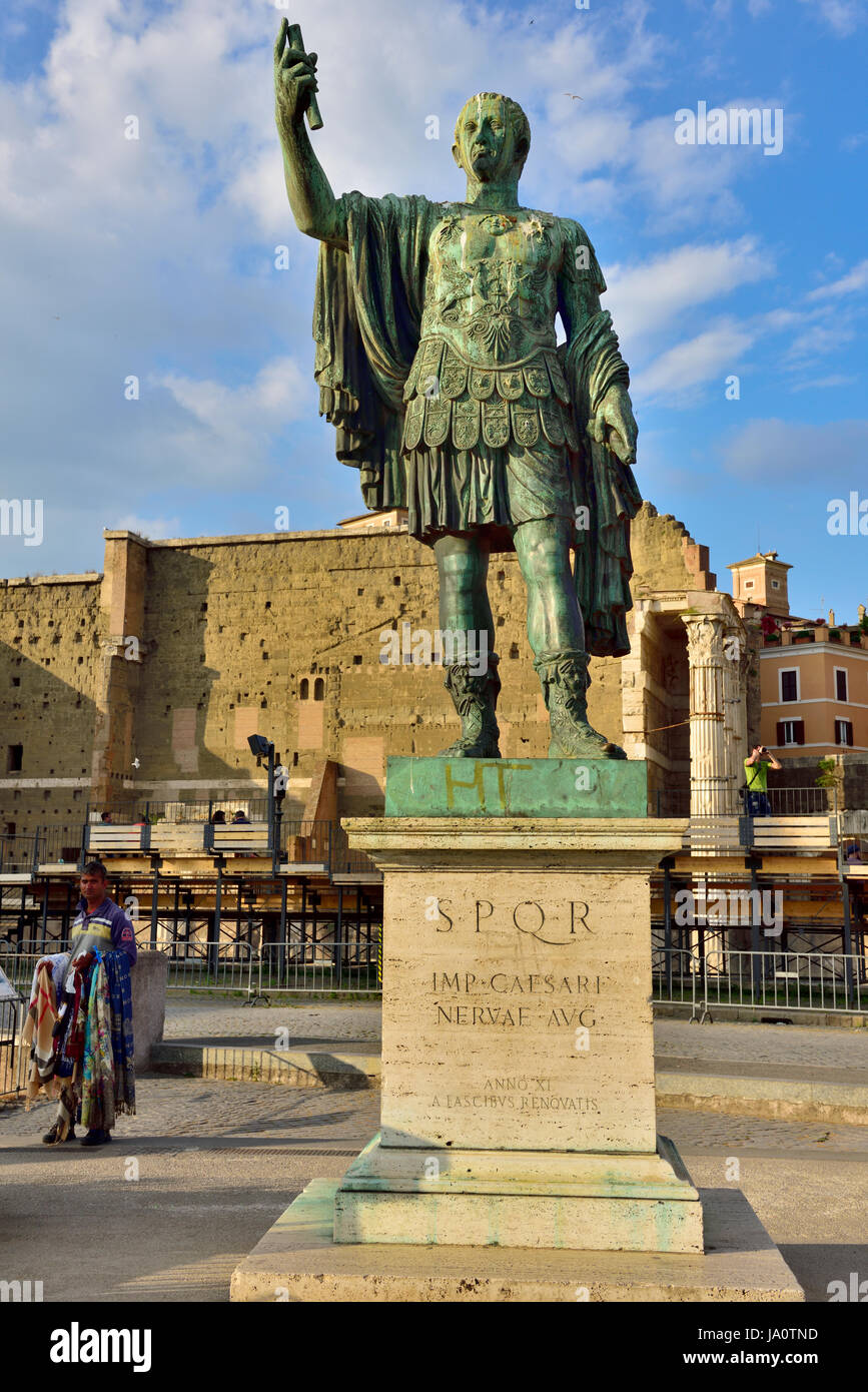 Statue of Marcus Caesari di Nerva with Forum of Augustus in background ...