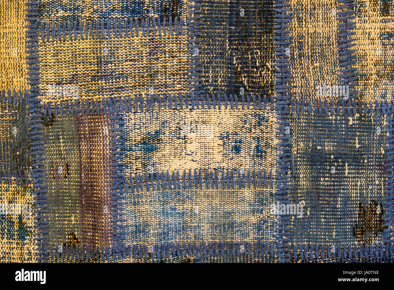 Texture of a piece of old carpet to sew thick threads Stock Photo - Alamy