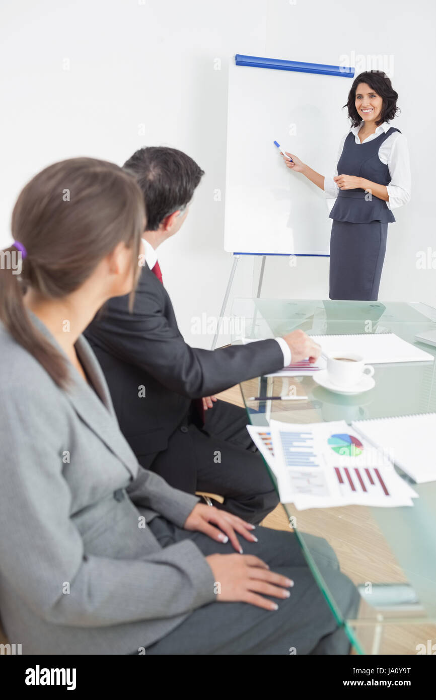 Business people listening to their manager carefully hands under the ...