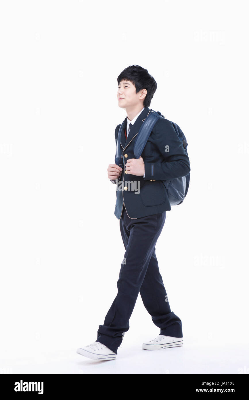 Indian student walking side view hi-res stock photography and images ...