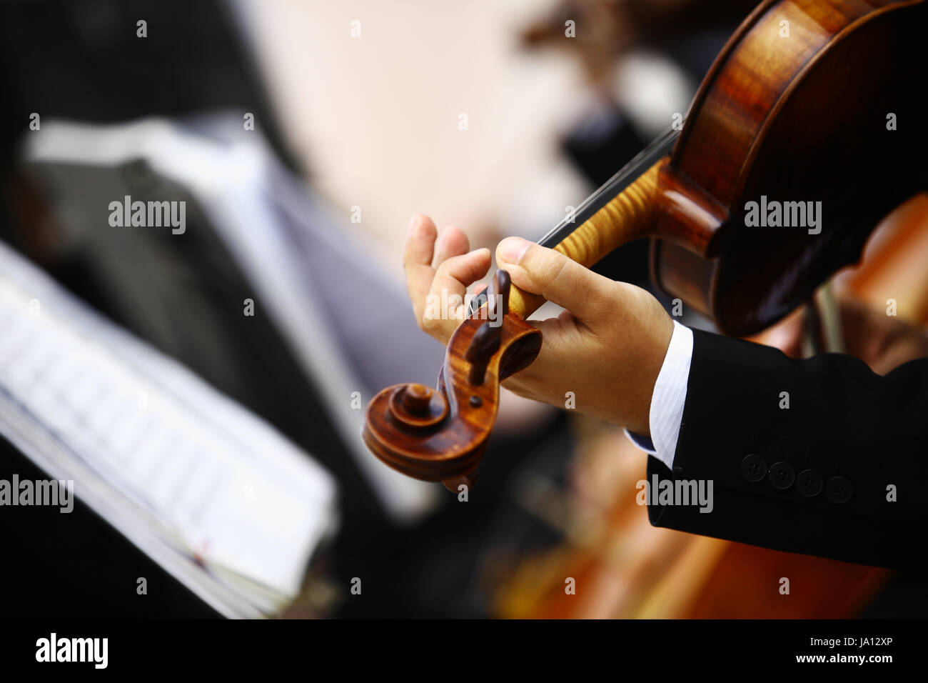 Detail of violin being played by a musician Stock Photo - Alamy