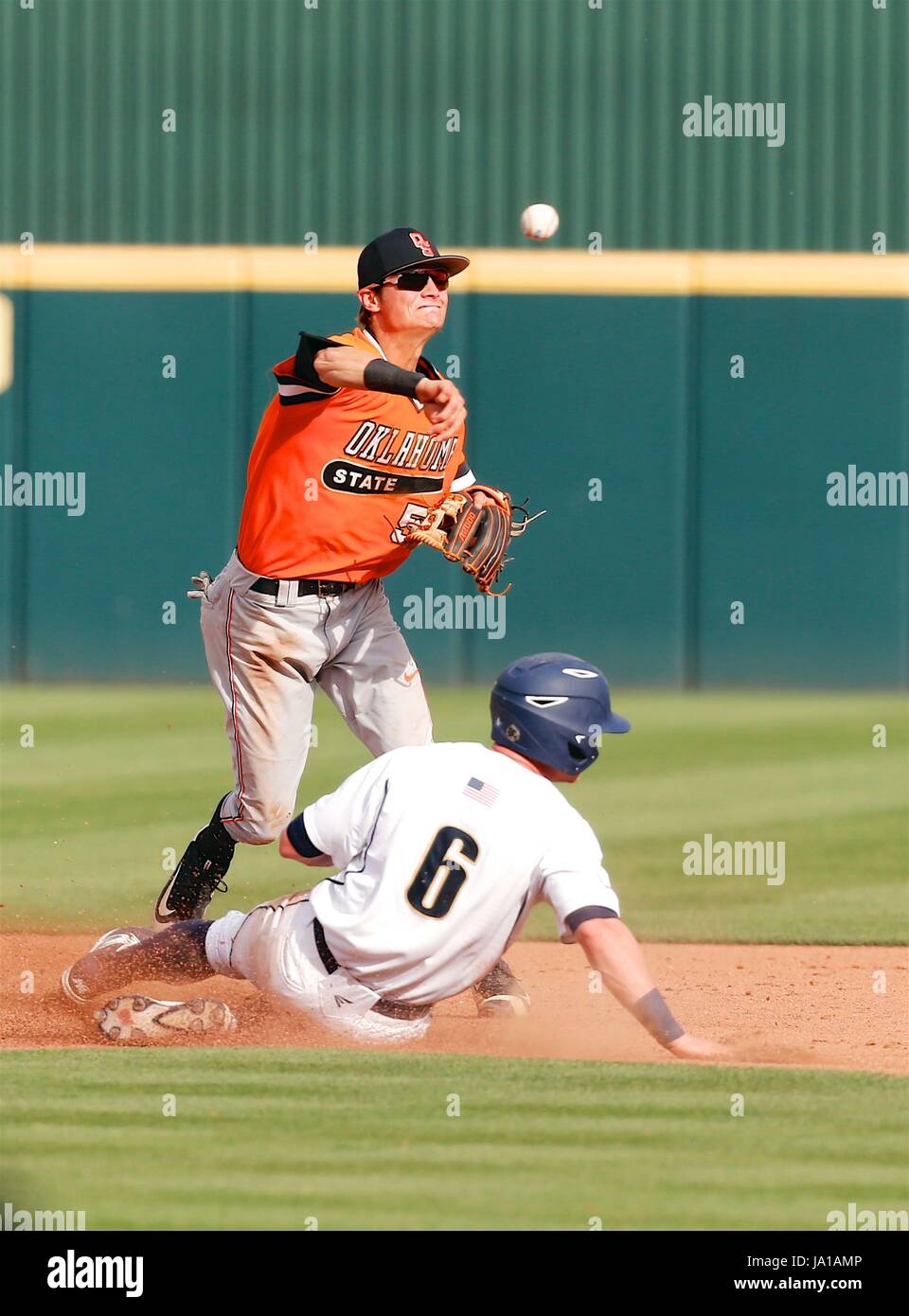 Jun 3, 2017: OSU short stop Cameron Hobbs #5 attempts to turn two as ...