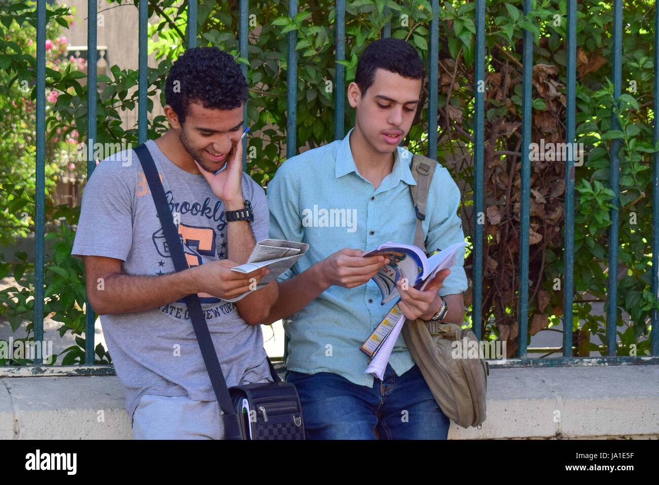 Cairo, Egypt. 4th June, 2017. Egyptian students stand outside their ...