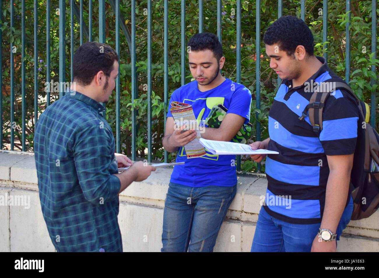 Cairo, Egypt. 4th June, 2017. Egyptian students stand outside their ...