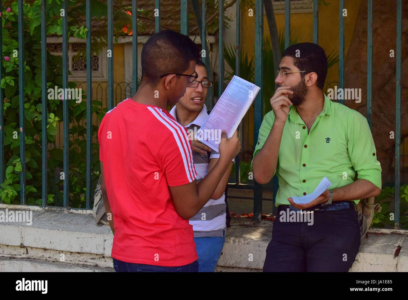 Cairo, Egypt. 4th June, 2017. Egyptian students stand outside their ...