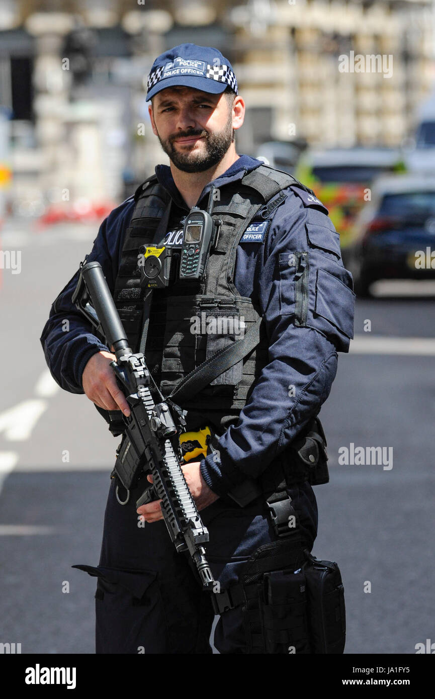 Armed police stand hi-res stock photography and images - Alamy