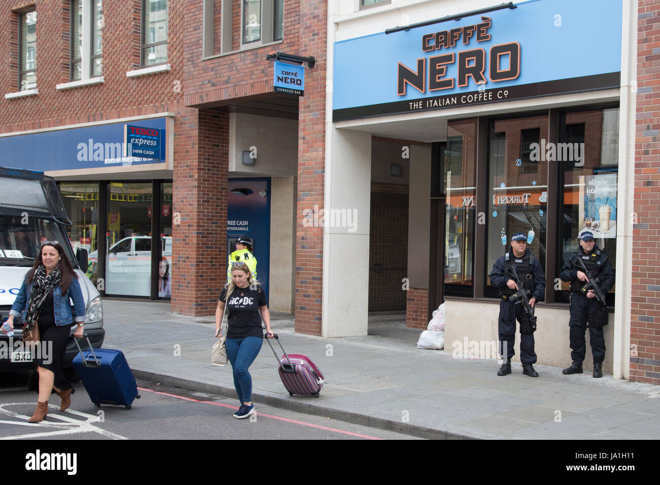 London UK. 4th June 2017 Armed police officers stand guard at the ...