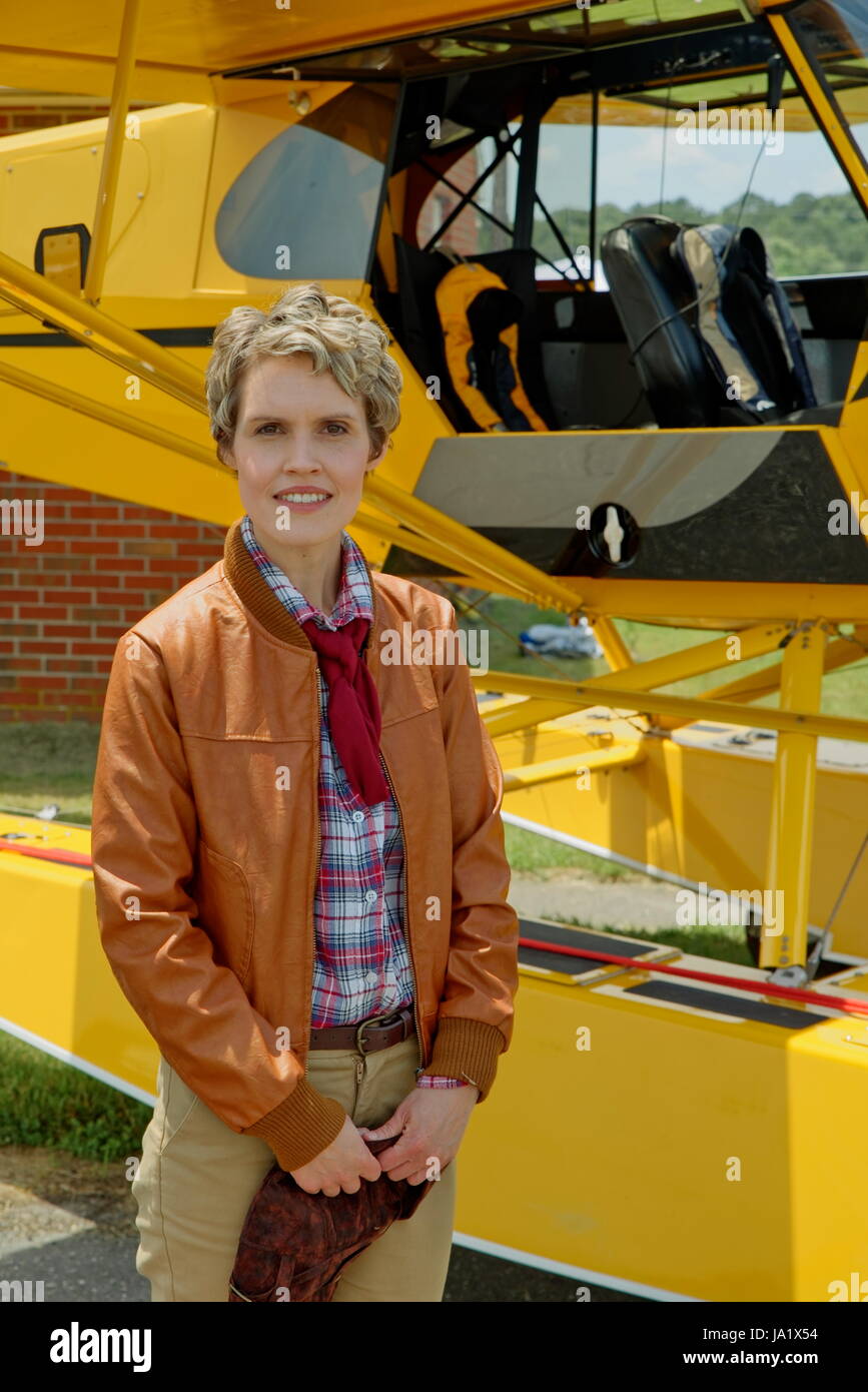 Female pilot dressed in retro leather aviator's jacket Stock Photo - Alamy