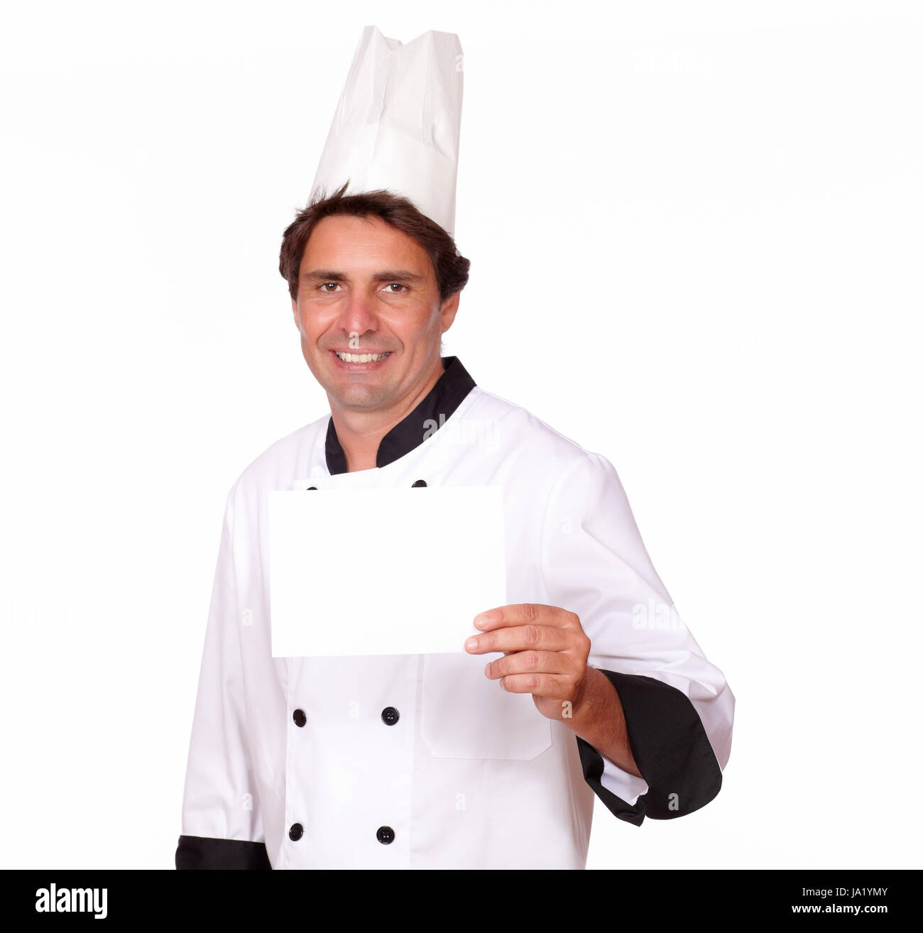 Portrait of a charming chef holding a blank card of copyspace on white ...