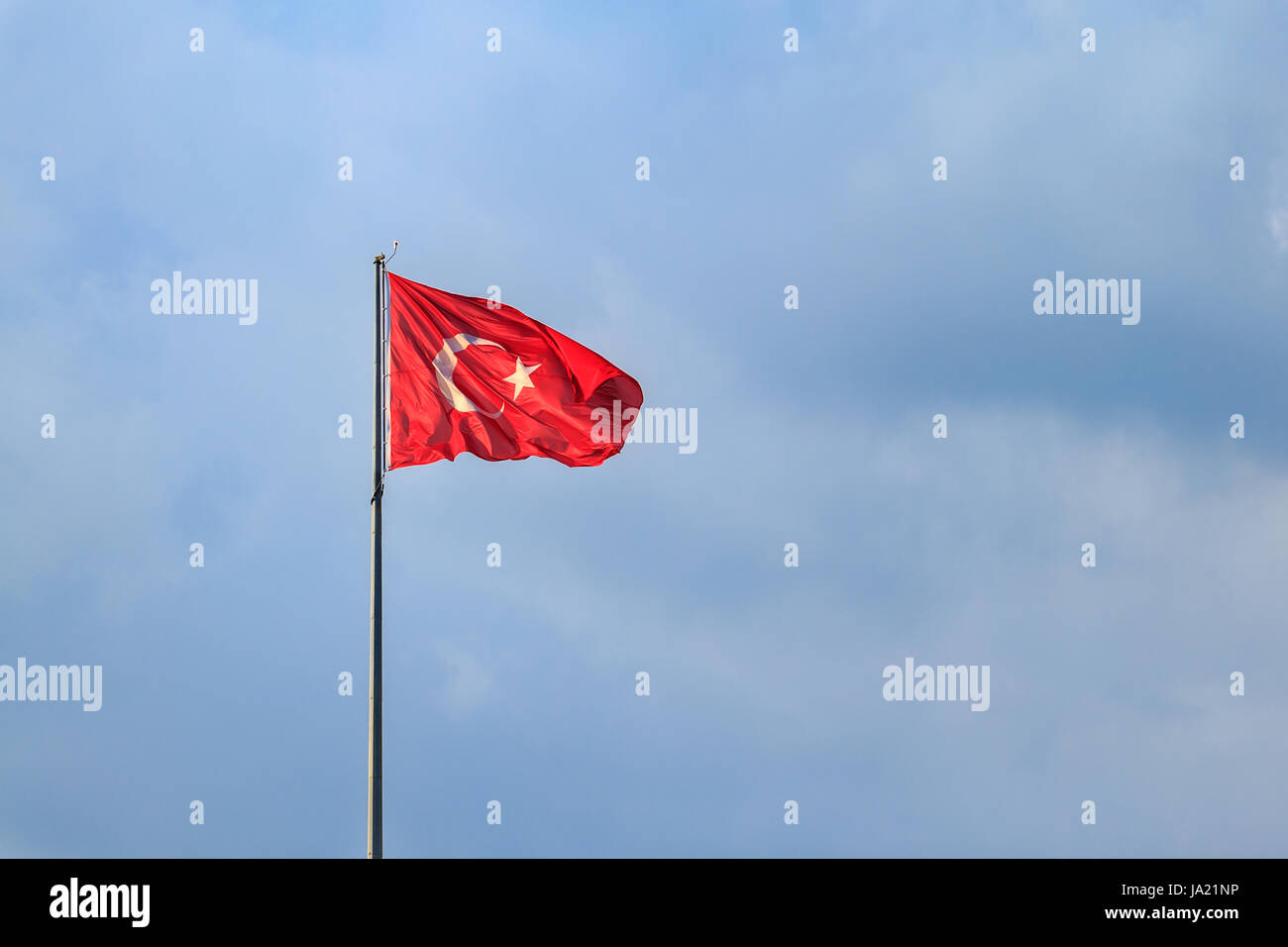 Turkish flag with blue sky Stock Photo - Alamy