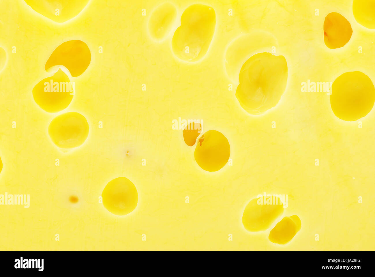 Background image of a large block of cheese Stock Photo - Alamy