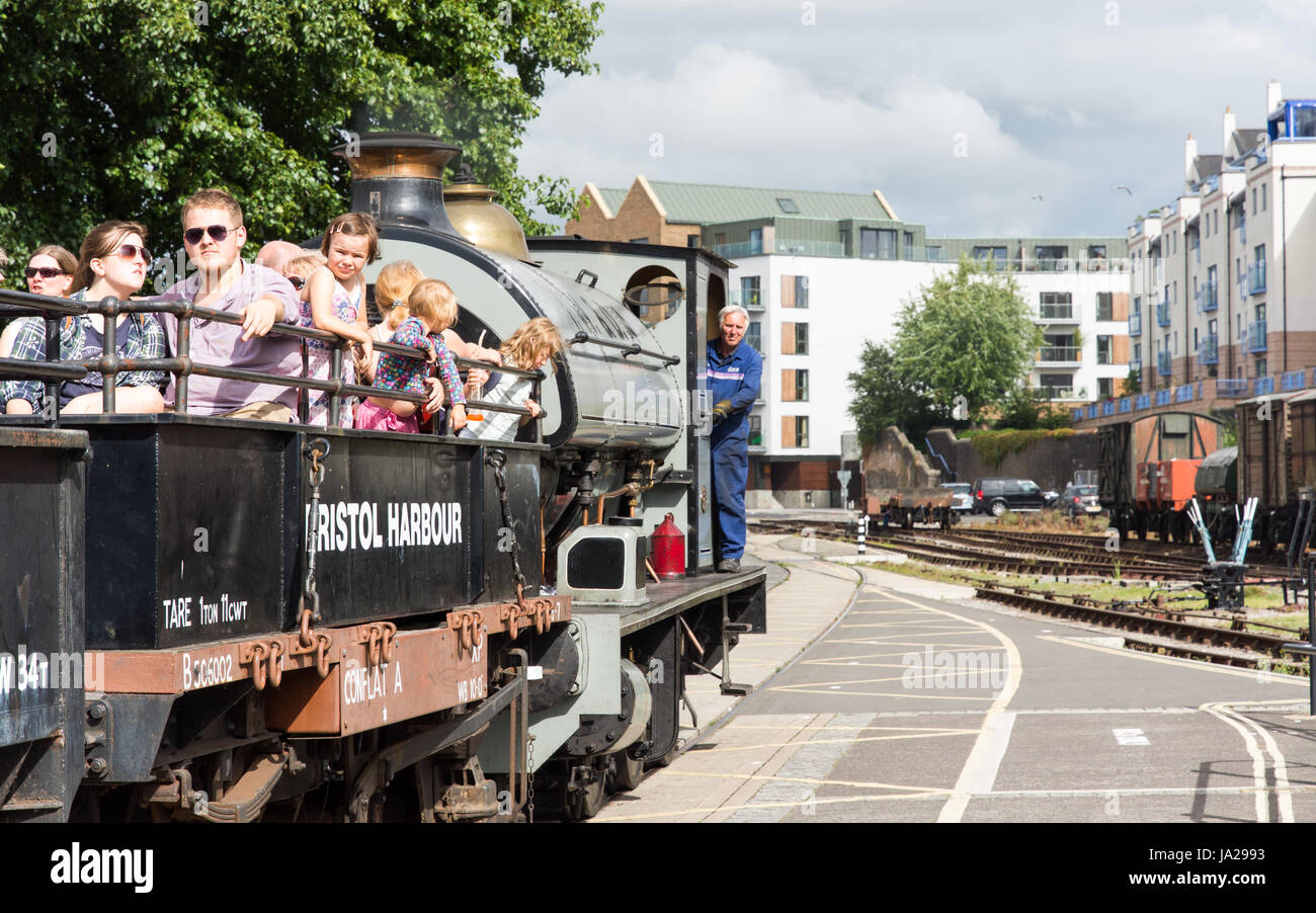 Bristol, England - July 17, 2016: People ride on a train driven by a ...