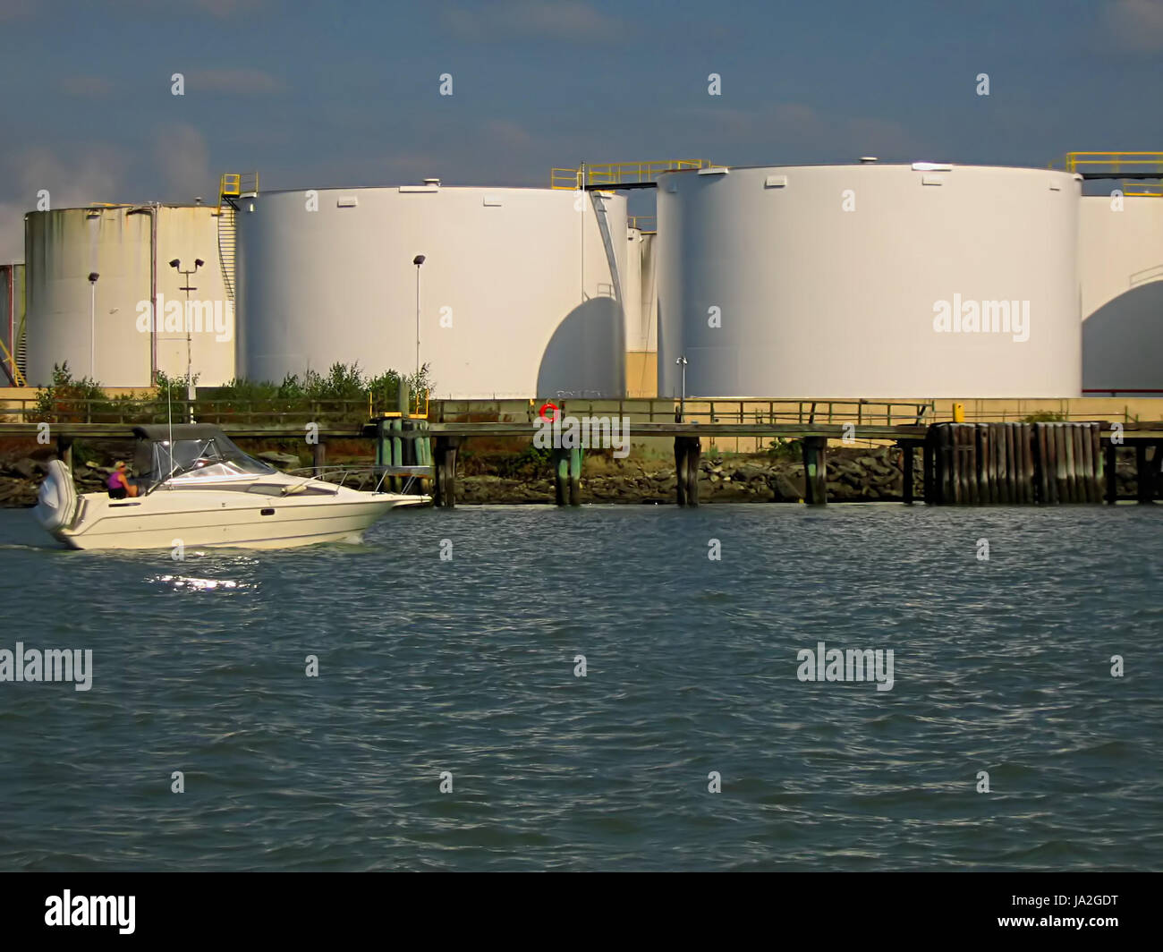 A photograph of a motorized boat traveling through the waterway of an ...