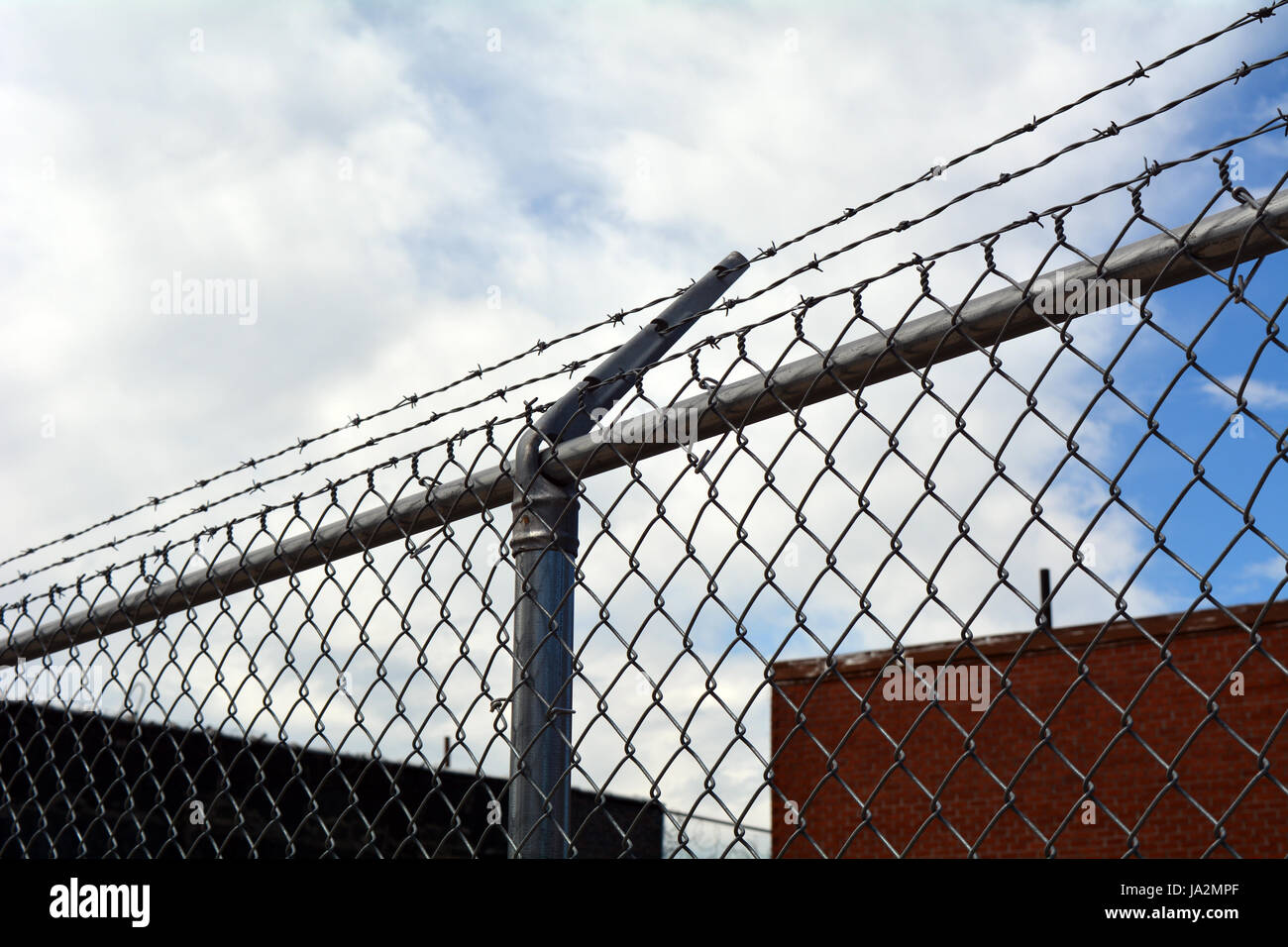 Barbed wire chain link fence hi-res stock photography and images - Alamy