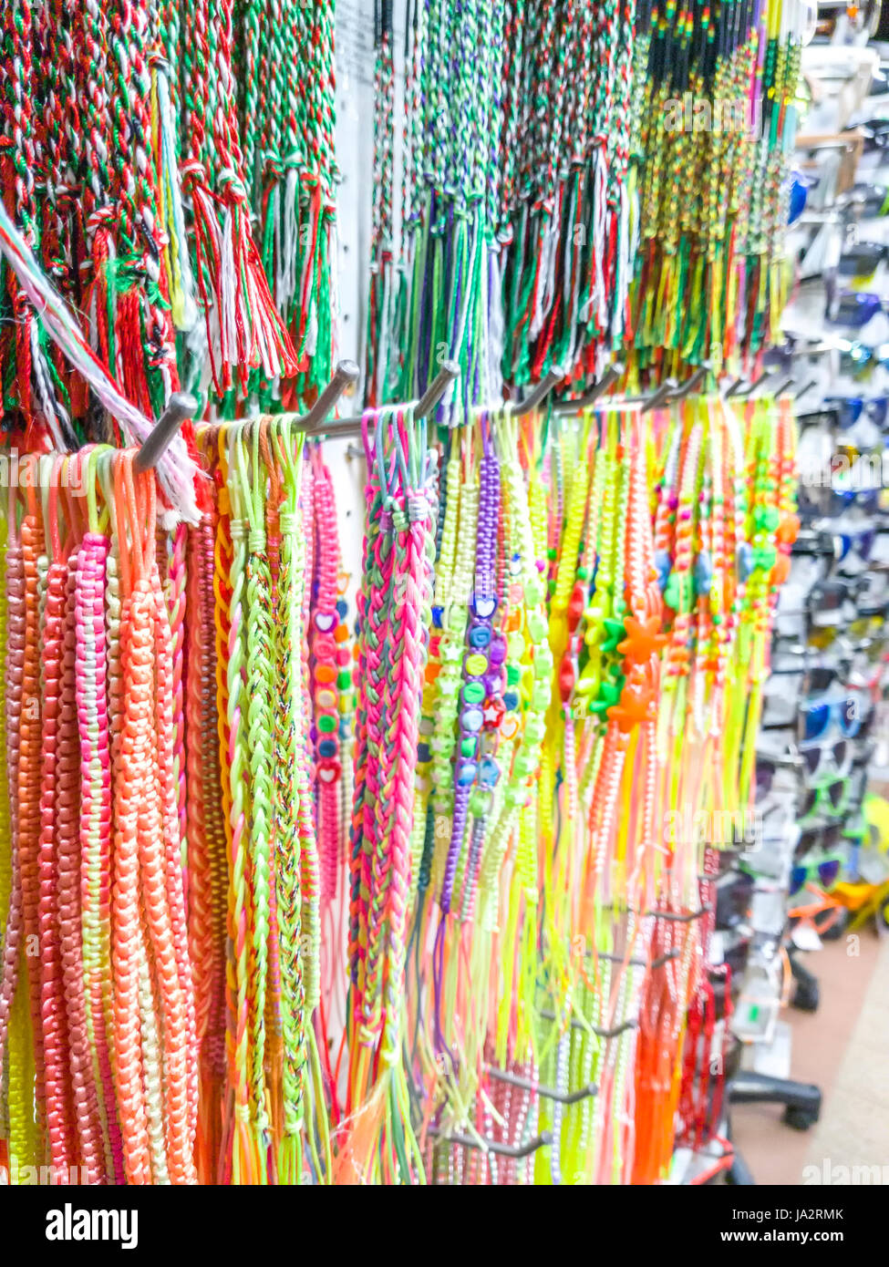 Rows Of Colorful Bracelets At A Street Market Stock Photo - Alamy