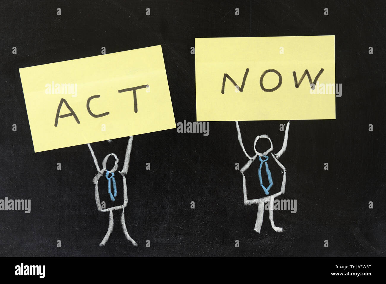 Chalk drawing - Act now Stock Photo - Alamy