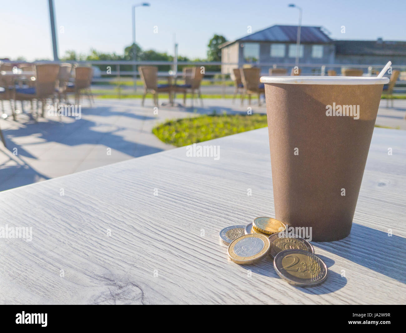 Cup of coffee with morning sunlight Stock Photo - Alamy