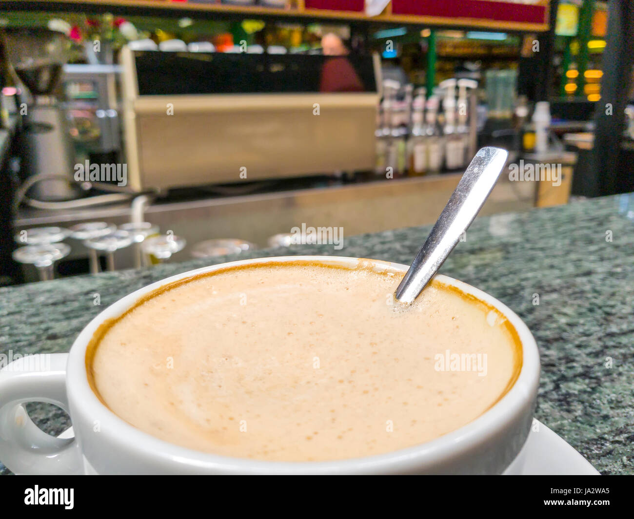 Cappucino close up view with selective focus and blur background Stock ...