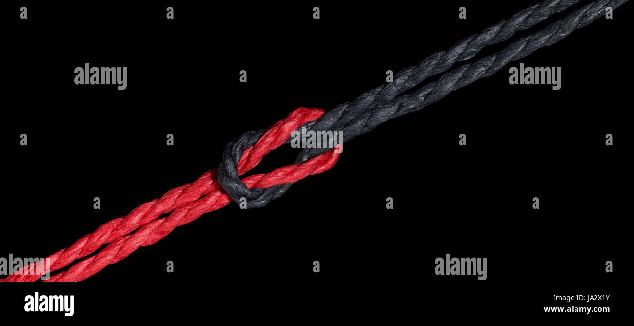 a red and a black string knotted together Stock Photo - Alamy