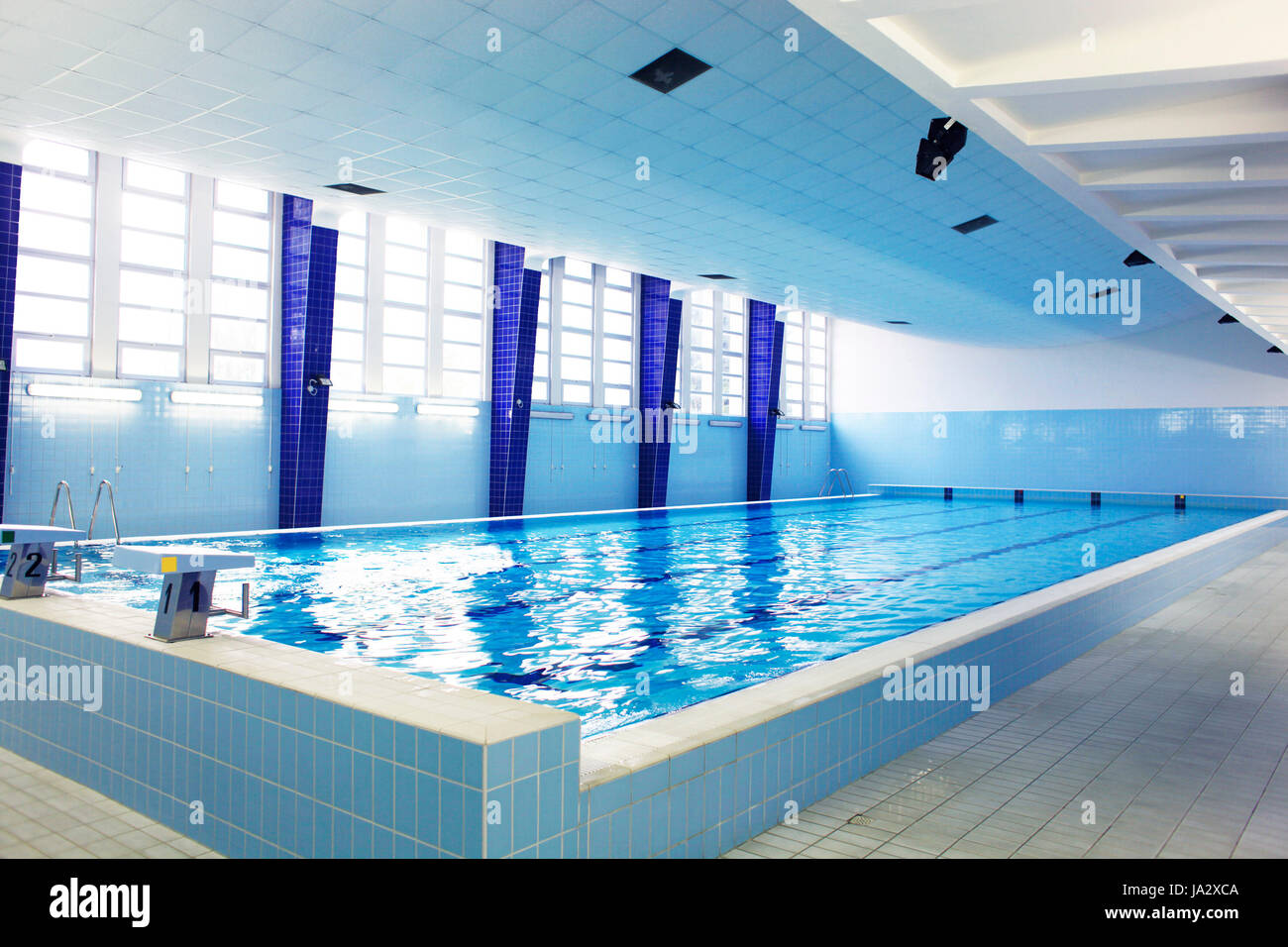 Indoor swimming pool with diving board hi-res stock photography and ...