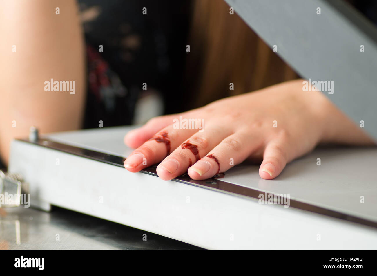 Paper Cutter Cuts Off Fingers