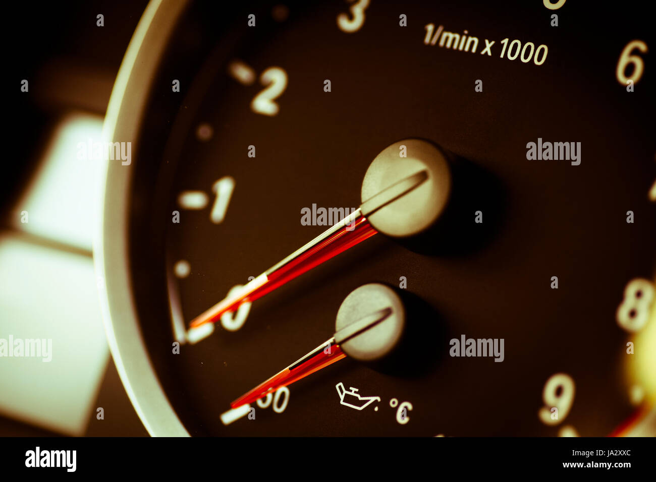 Detail with the tachometer of a sports car Stock Photo - Alamy