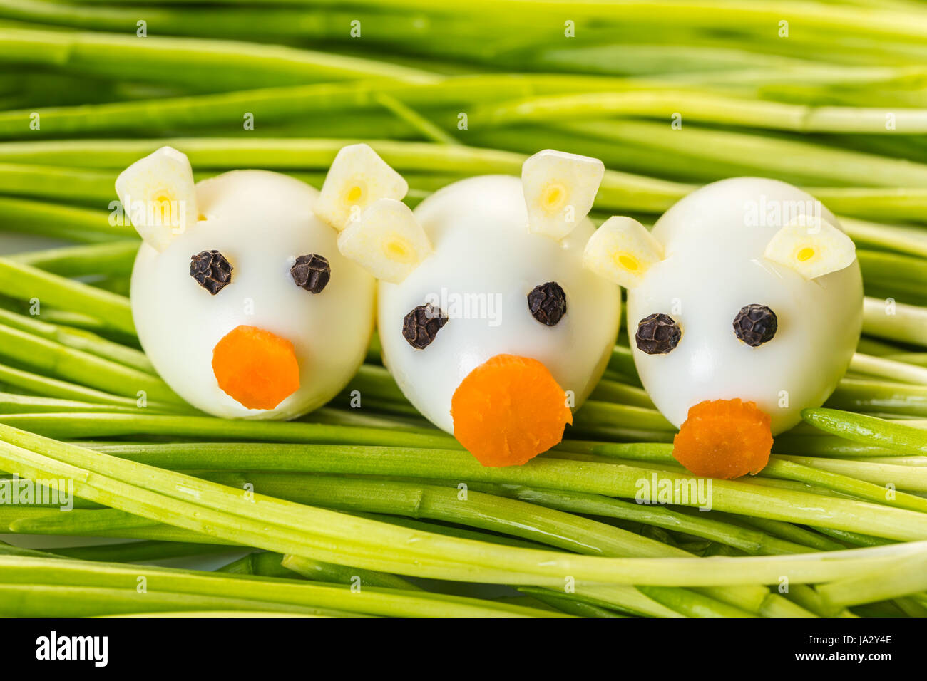 Children food, little pigs of quail eggs Stock Photo - Alamy