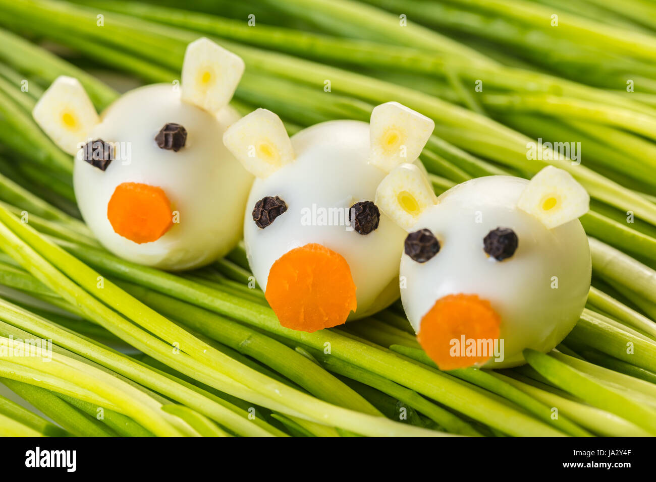 Children food, little pigs of quail eggs Stock Photo - Alamy