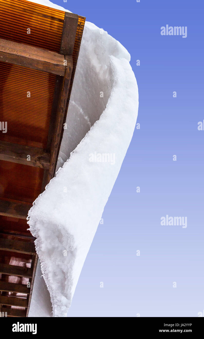 Snow slides off the roof gazebo Stock Photo - Alamy