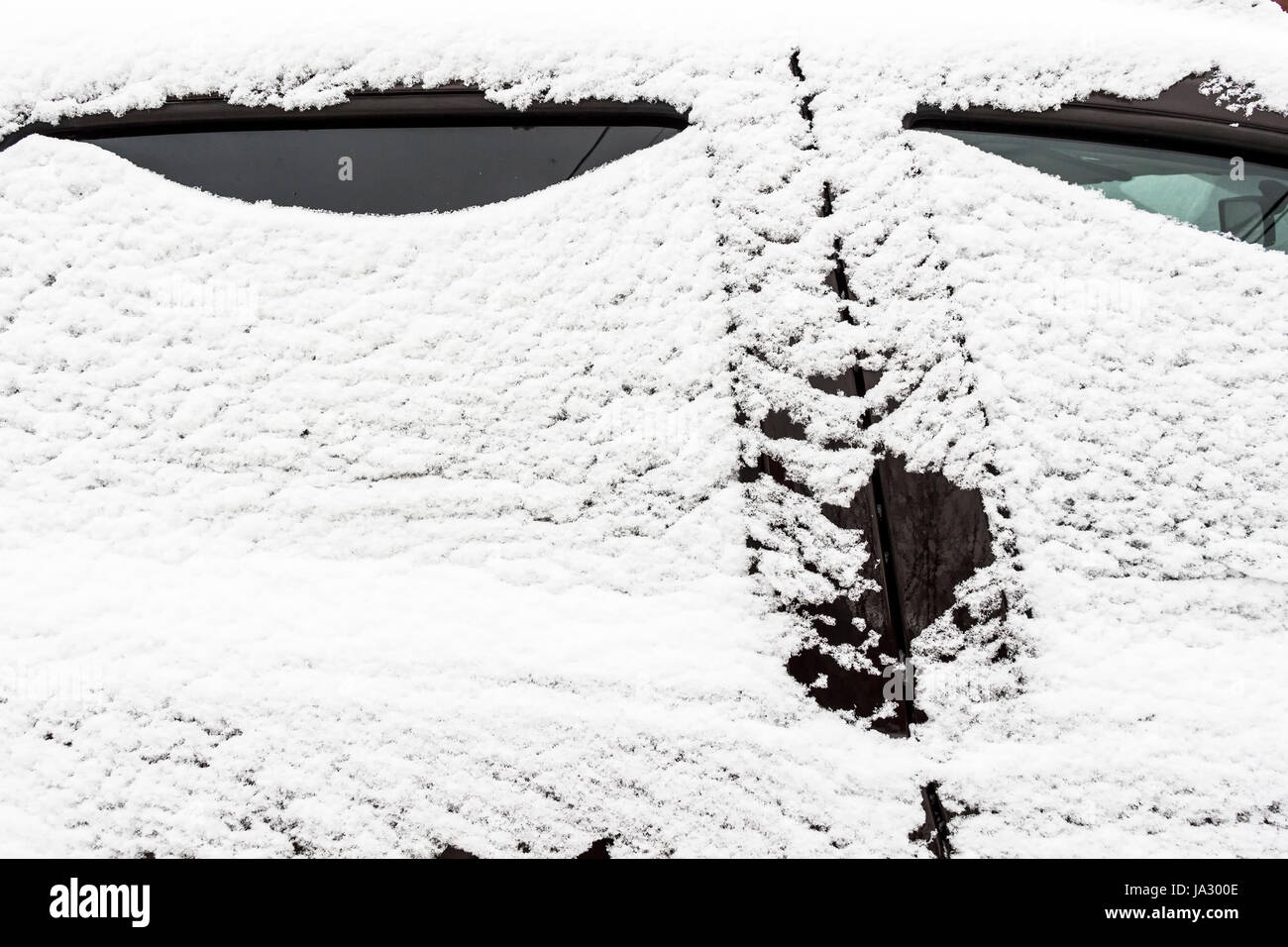 Car under snow closeup Stock Photo - Alamy