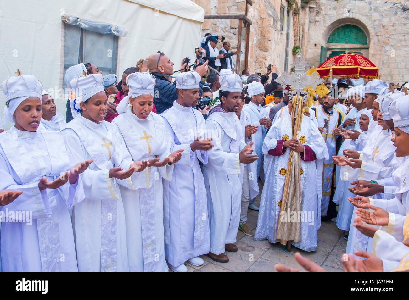 Ethiopian Orthodox pilgrims participates in the Holy fire ceremony at ...