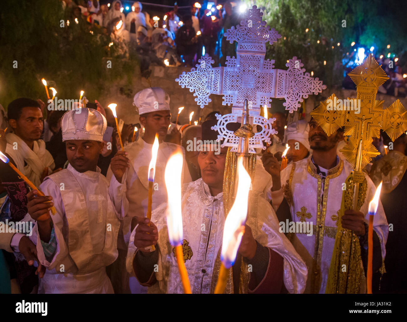 Ethiopian Orthodox pilgrims participates in the Holy fire ceremony at ...