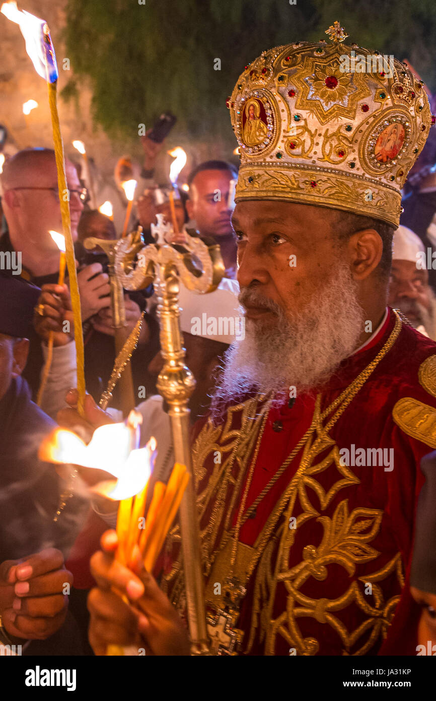 Ethiopian Orthodox pilgrim participates in the Holy fire ceremony at ...