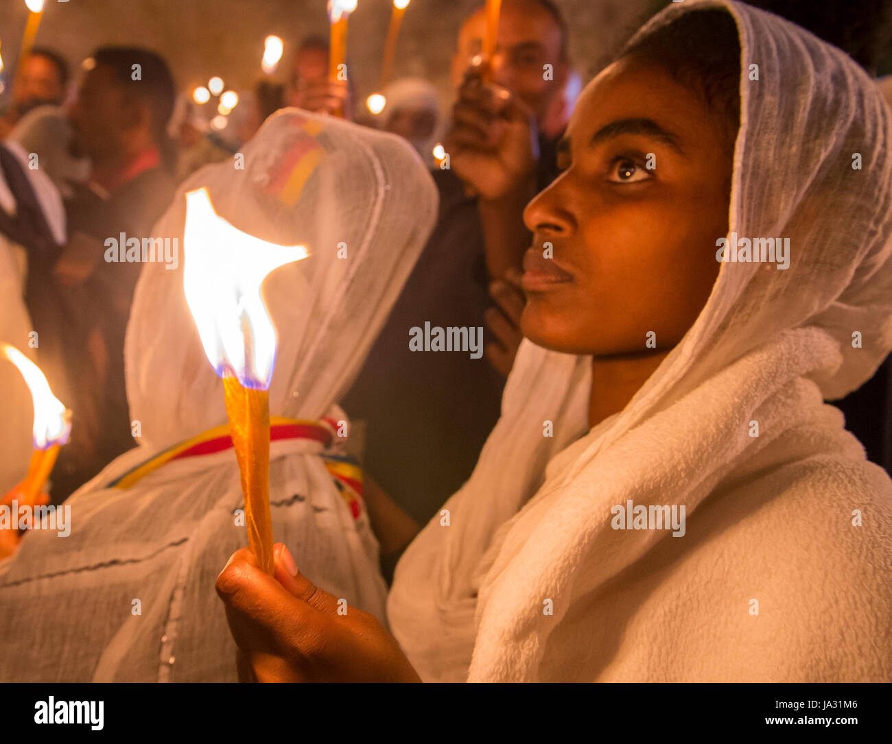 Ethiopian Orthodox pilgrims participates in the Holy fire ceremony at ...