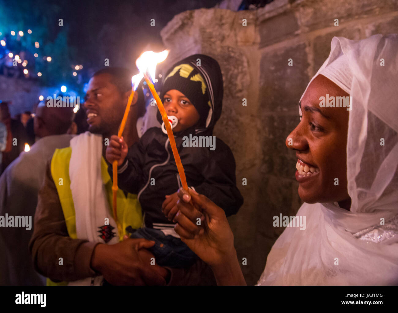 Ethiopian Orthodox pilgrims participates in the Holy fire ceremony at ...