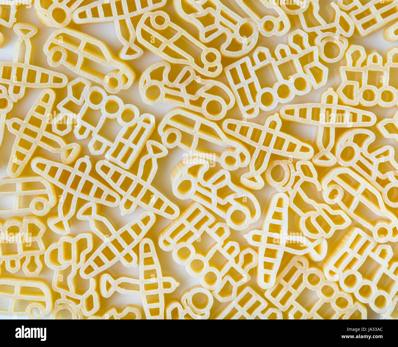 Abstract background texture of pasta in the form of transport Stock ...
